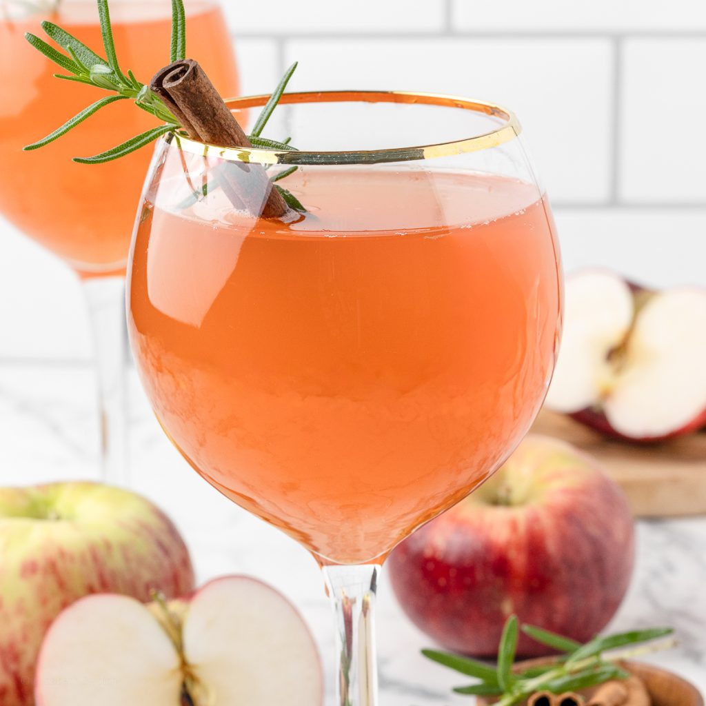 Apple Cider Aperol Spritz Mocktail - Entirely Elizabeth